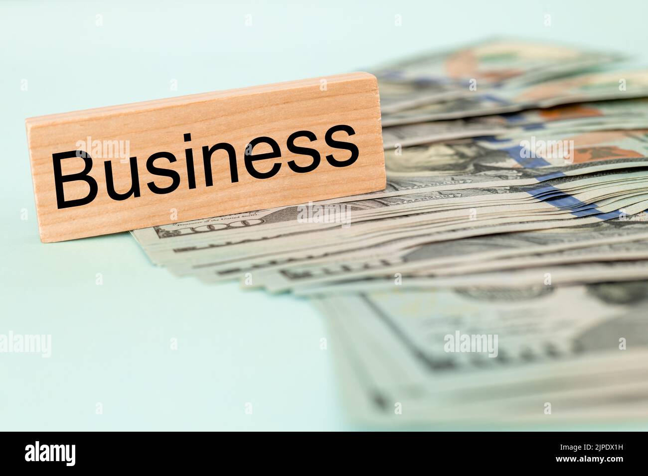 Business, The inscription on a wooden plate standing on a file of one ...