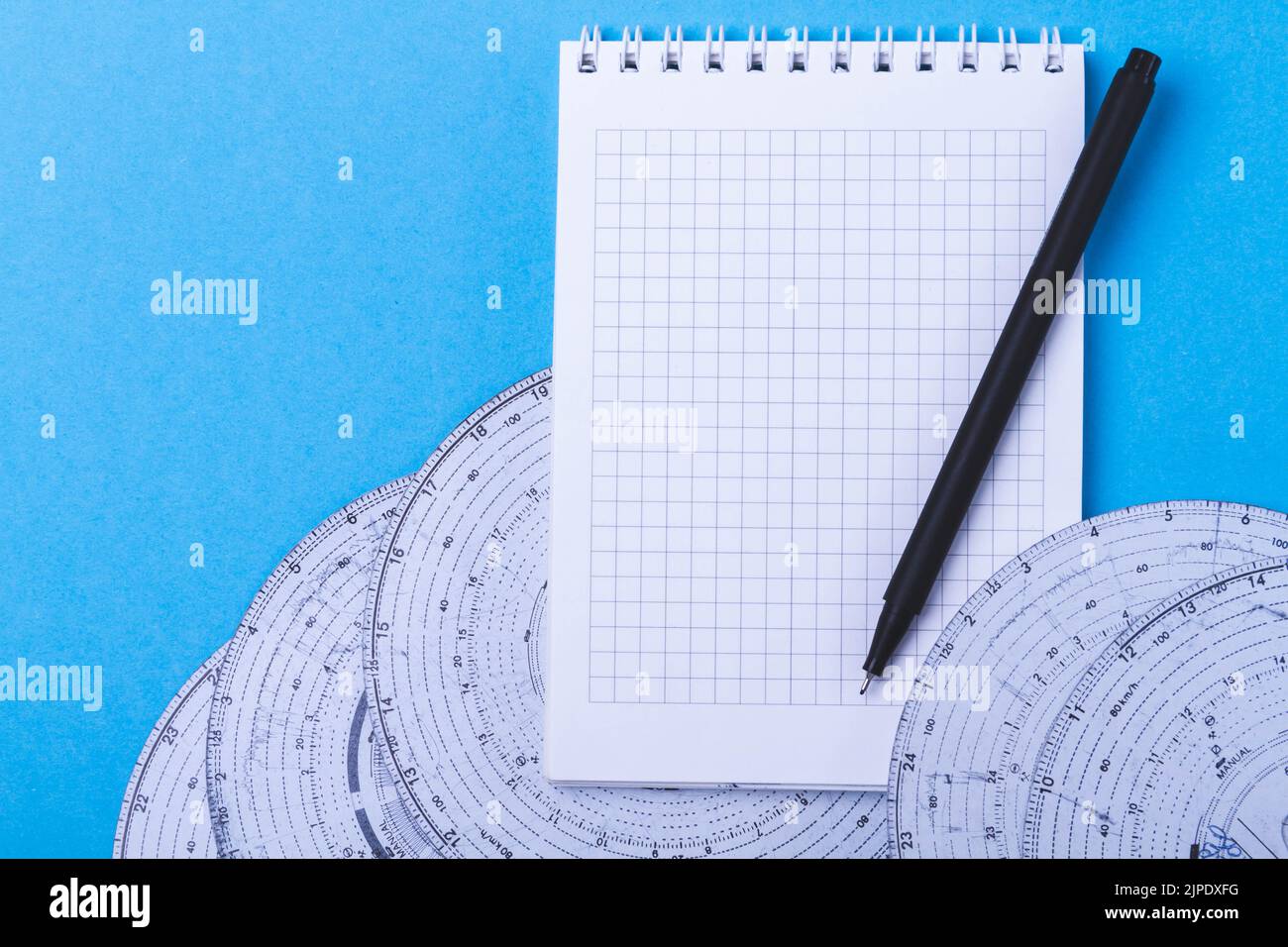 Tachograph and notepad. Driver time tracking. Fixing the movement of ...