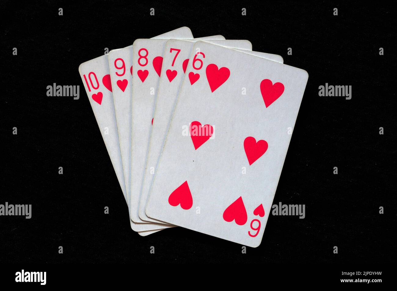 playing cards run of hearts 6,7,8,9,10 Stock Photo - Alamy