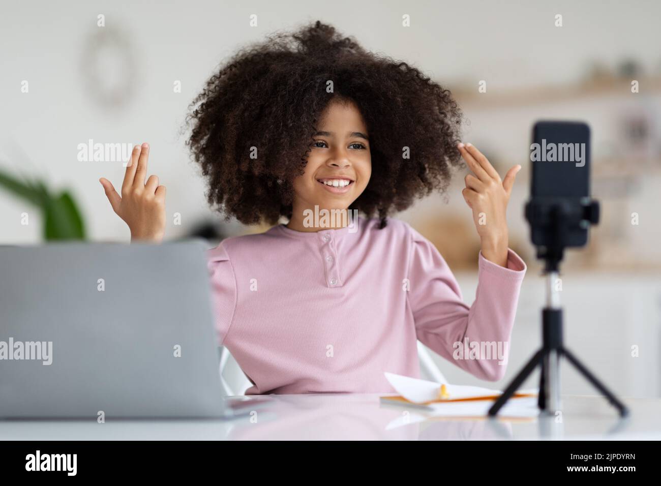 Famous kids blogger african american school girl streaming from home ...