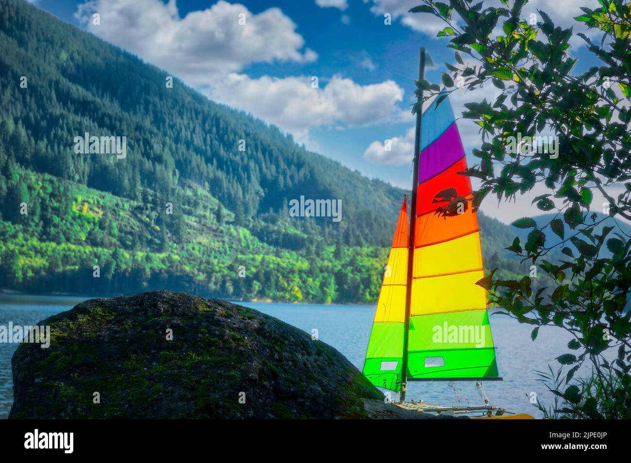 A Catamaran sits on the shores of the Kalama River in Washington Stock ...
