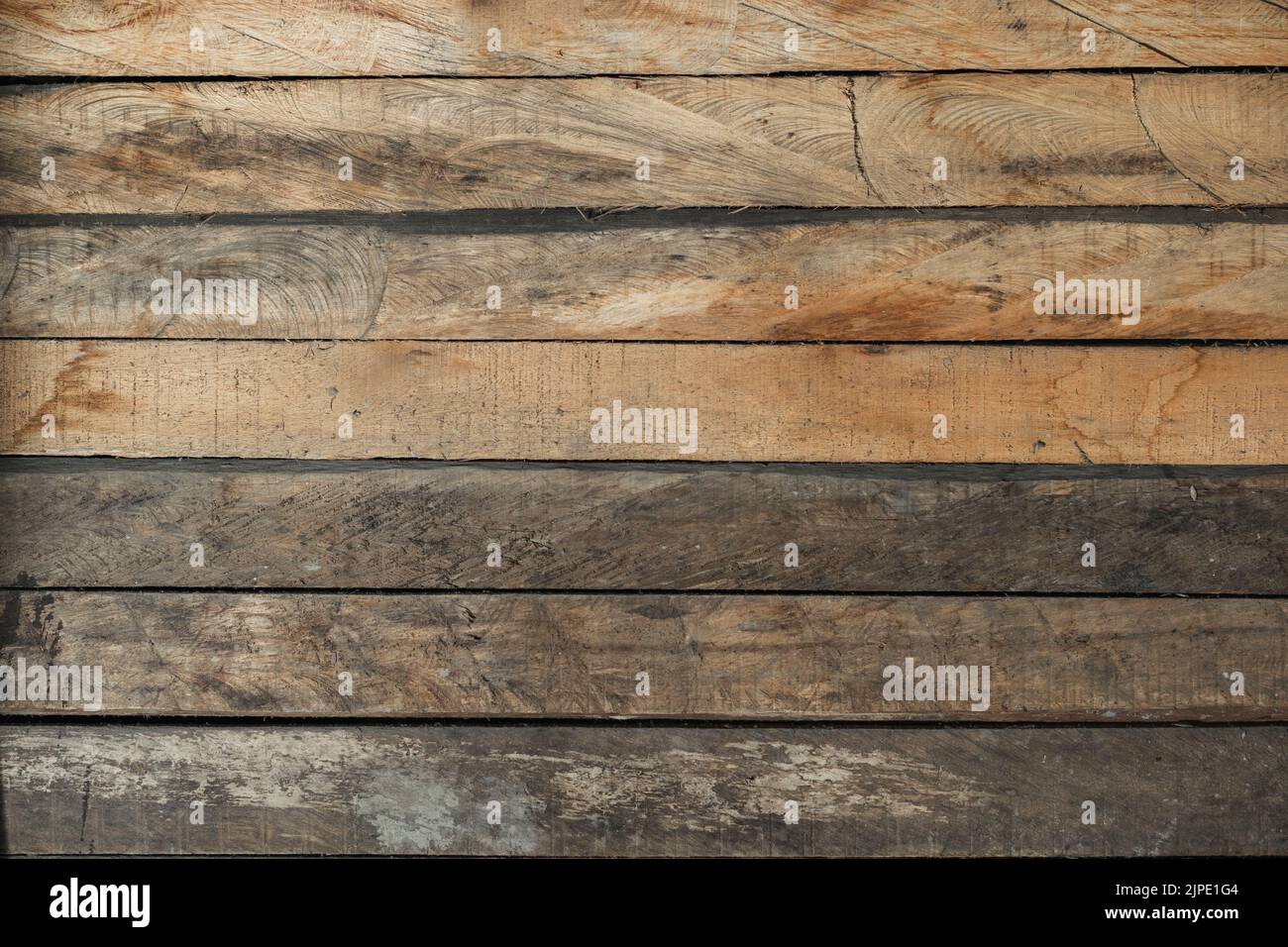 detailed view of orange wood plank background. wall of a low income ...