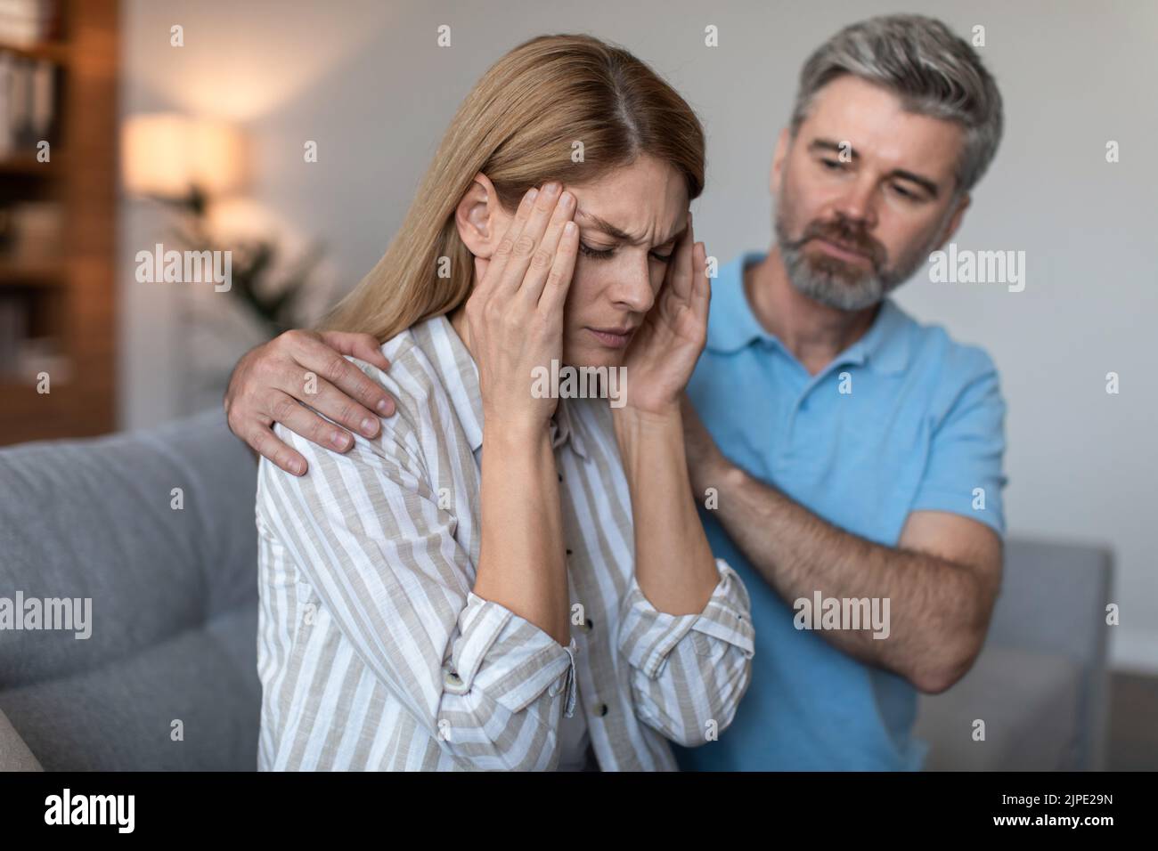 Sad man and woman hug hi-res stock photography and images - Alamy