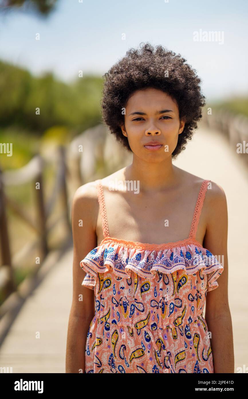 Black woman looking camera calm hi-res stock photography and images - Alamy