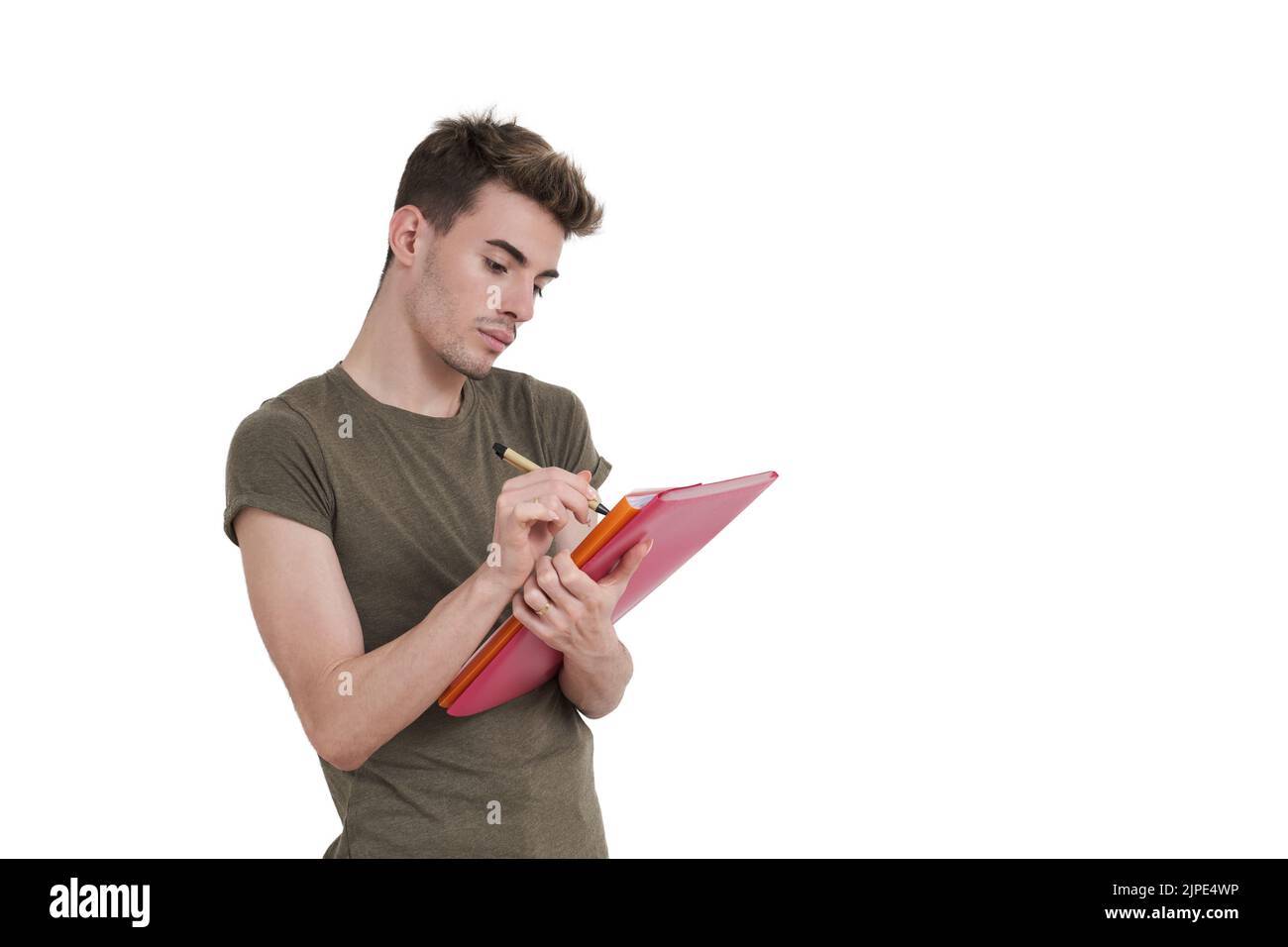 Young caucasian student writing on a folder, isolated Stock Photo - Alamy