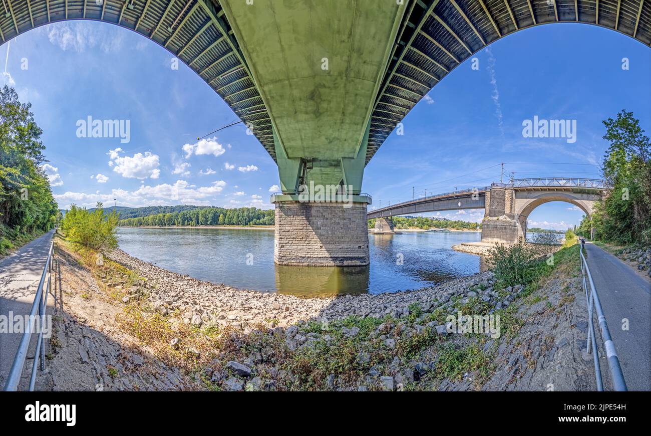 Wide angle view of a highway bridge from below with symetric geometries ...