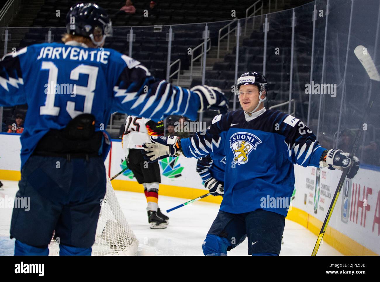 Finland's Roby Jarventie (13) and Kasper Simontaival (29) celebrate a ...