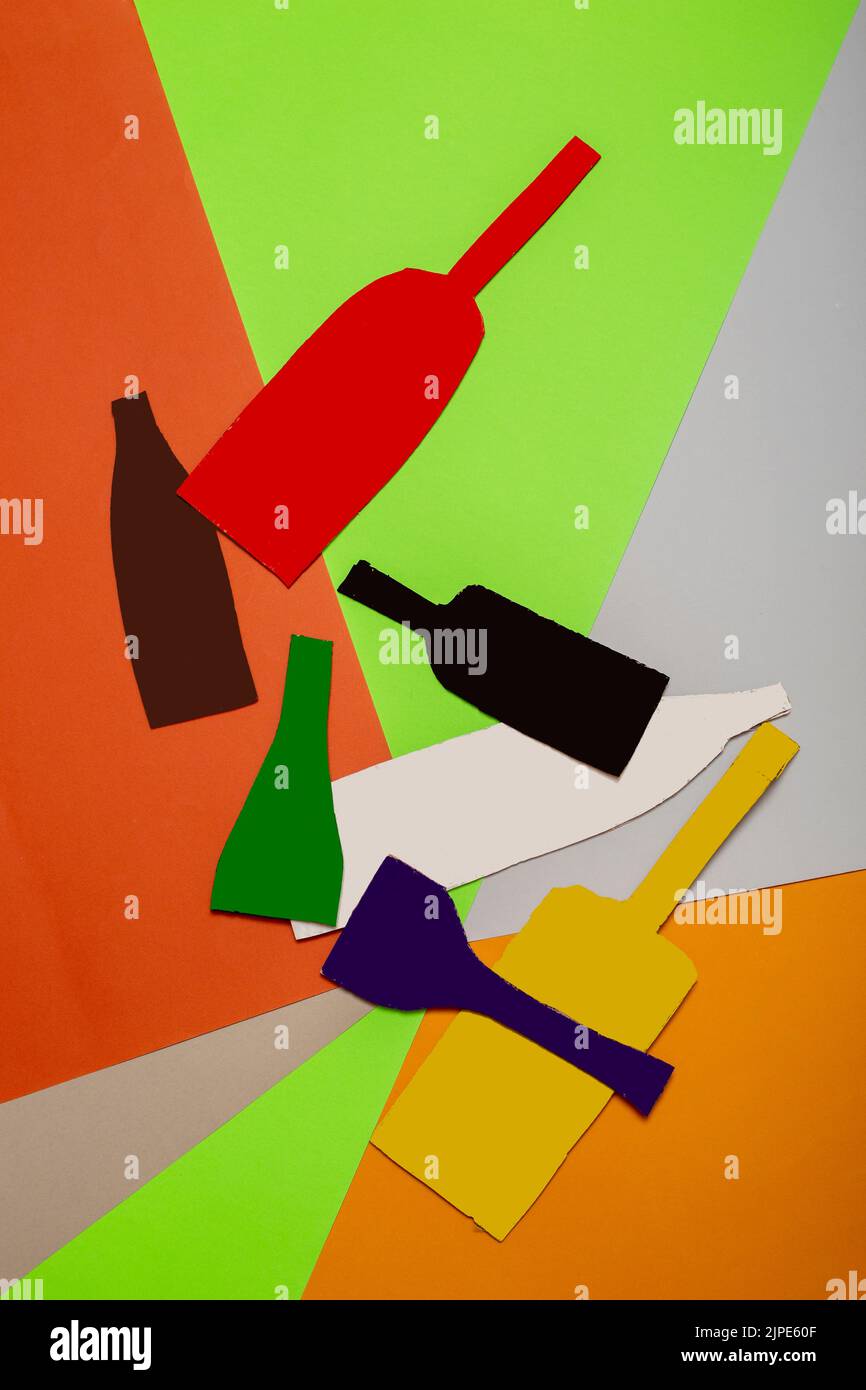 Abstract still life with cardboard cutout bottles on a colored ...