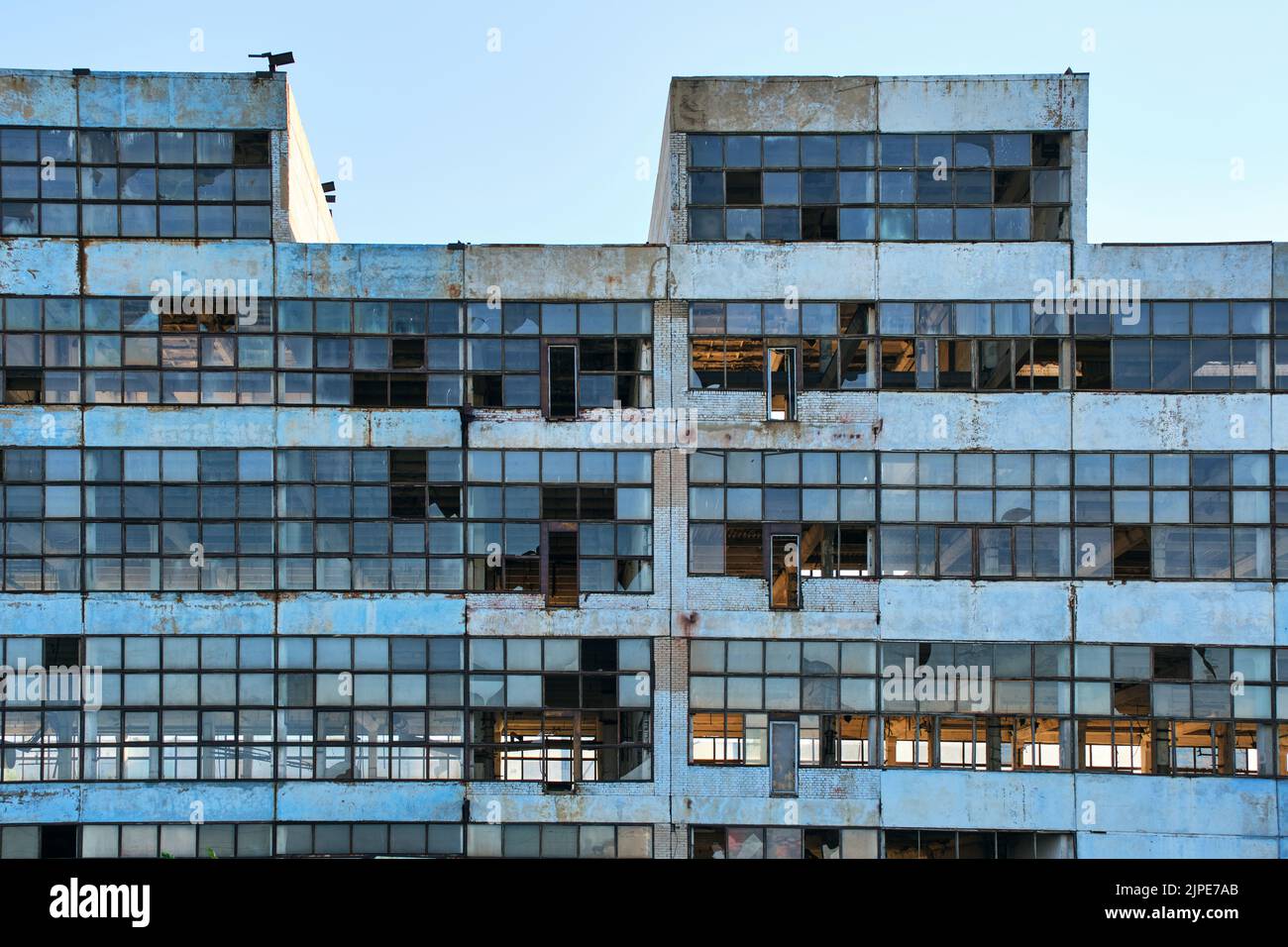 Old, abandoned, crumbling building industrial plant Stock Photo - Alamy