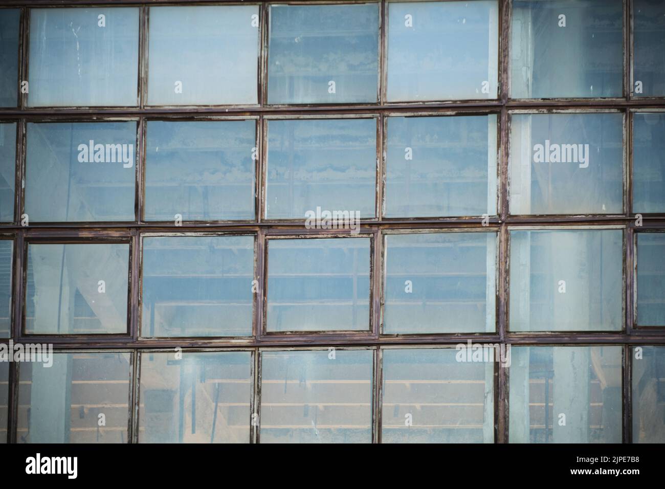 Old glass facade abandoned building Stock Photo - Alamy