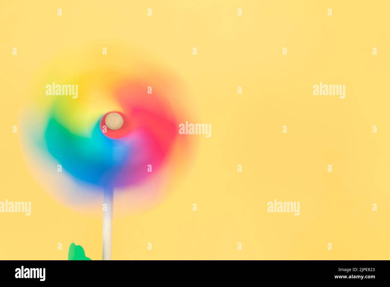 Moving coloured pinwheel on yellow background. Thematic lgtbq Stock ...