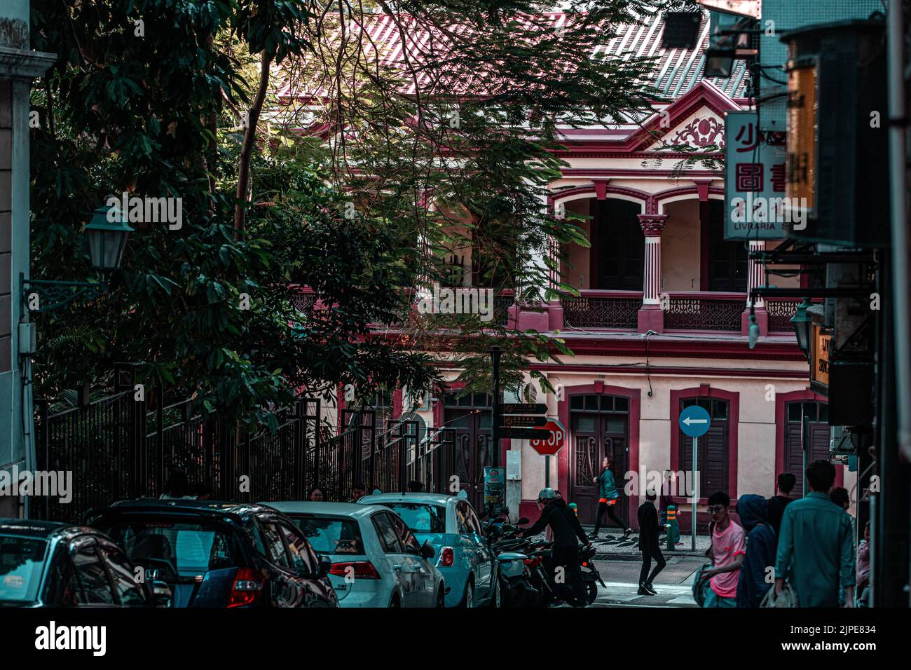 A traditional red, pink, and yellow Portuguese buildings in Macao Stock ...