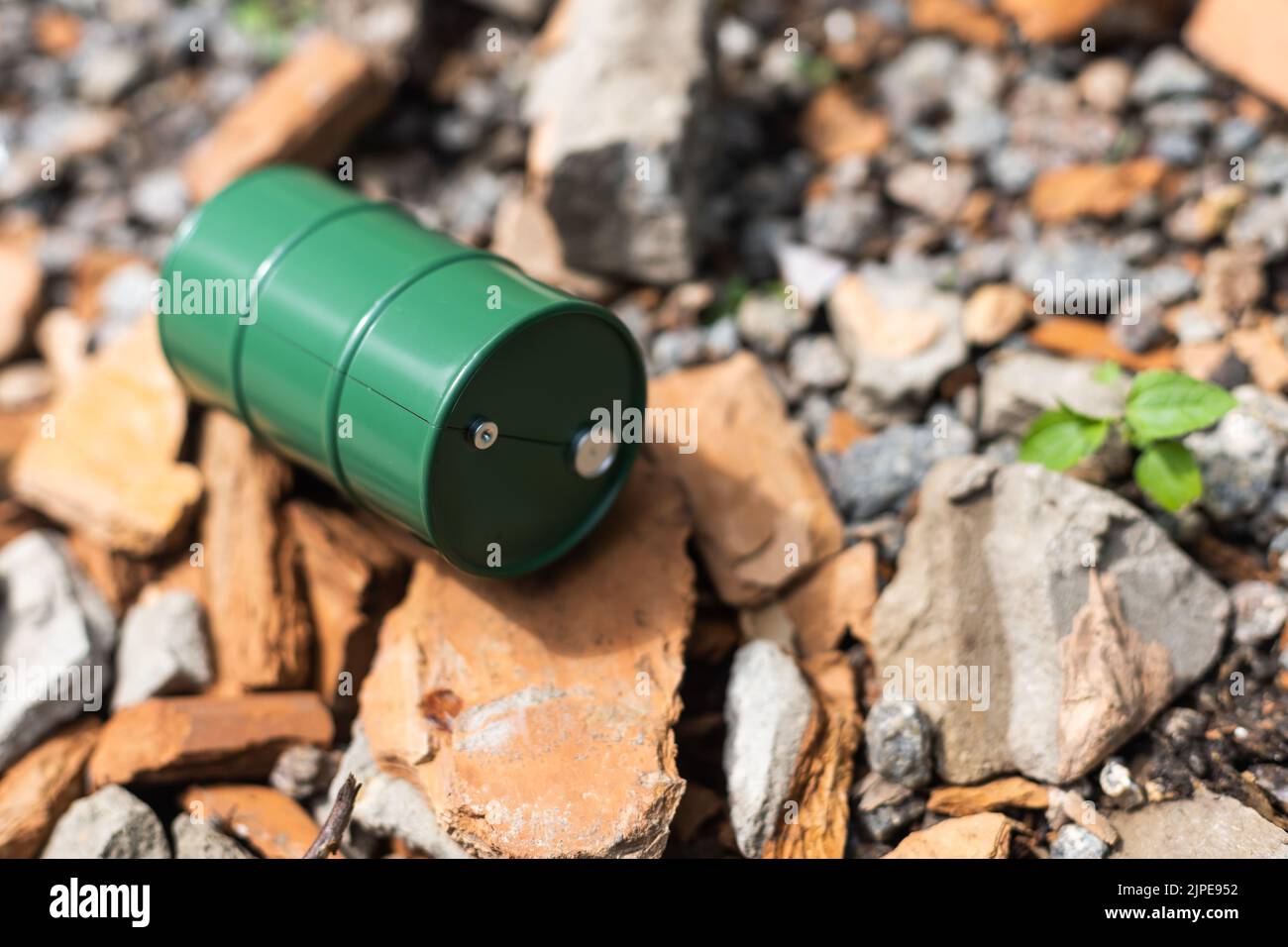 toy oil barrel on a natural background Stock Photo - Alamy