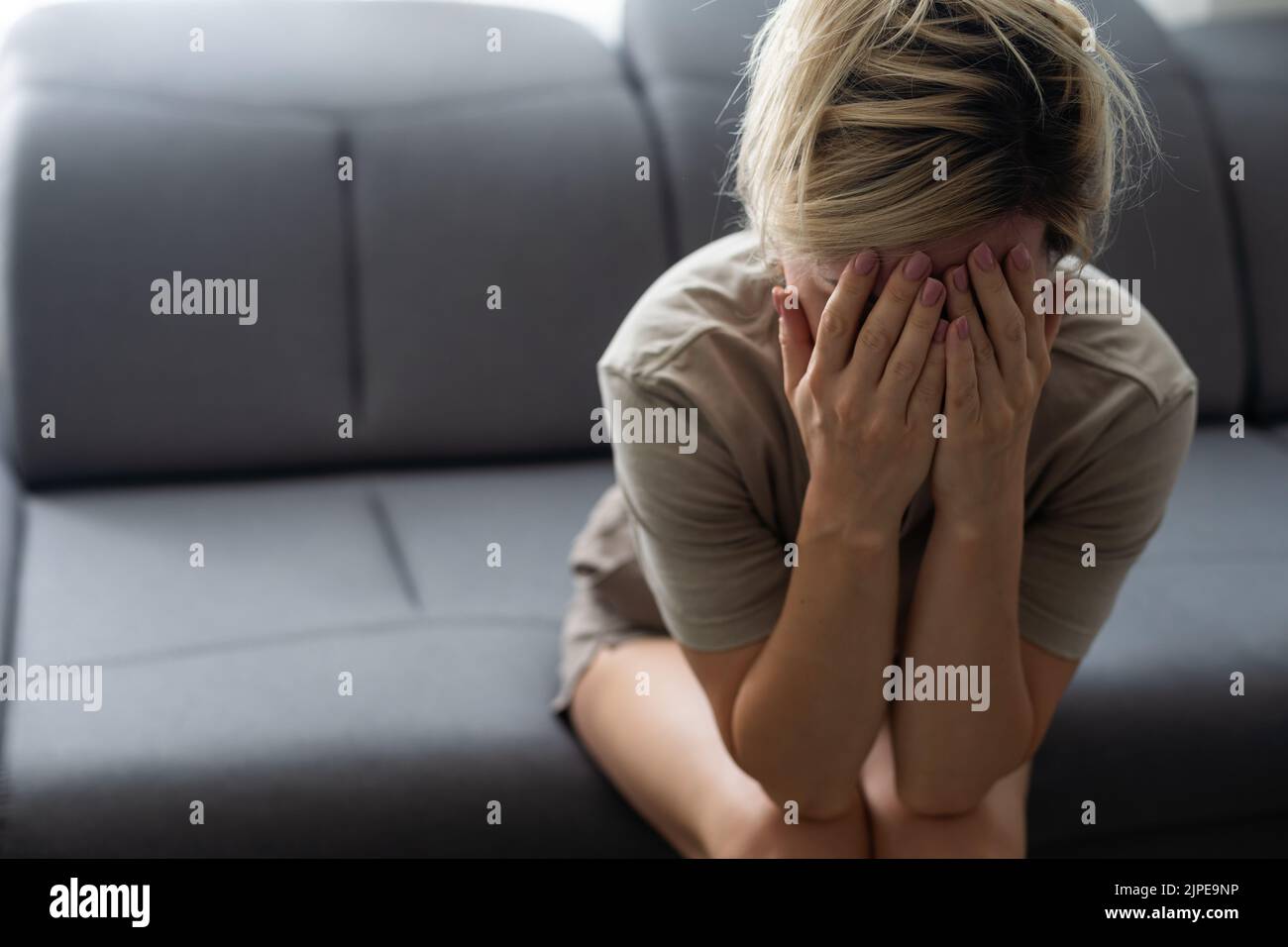 Stressed young sick woman having strong terrible headache suffering ...