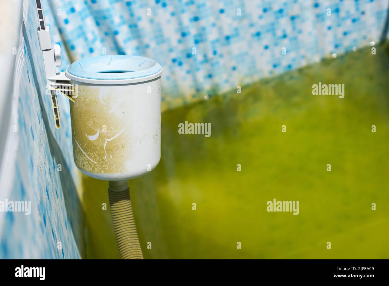 cleaner and filter very dirty swimming pool in the garden Stock Photo ...