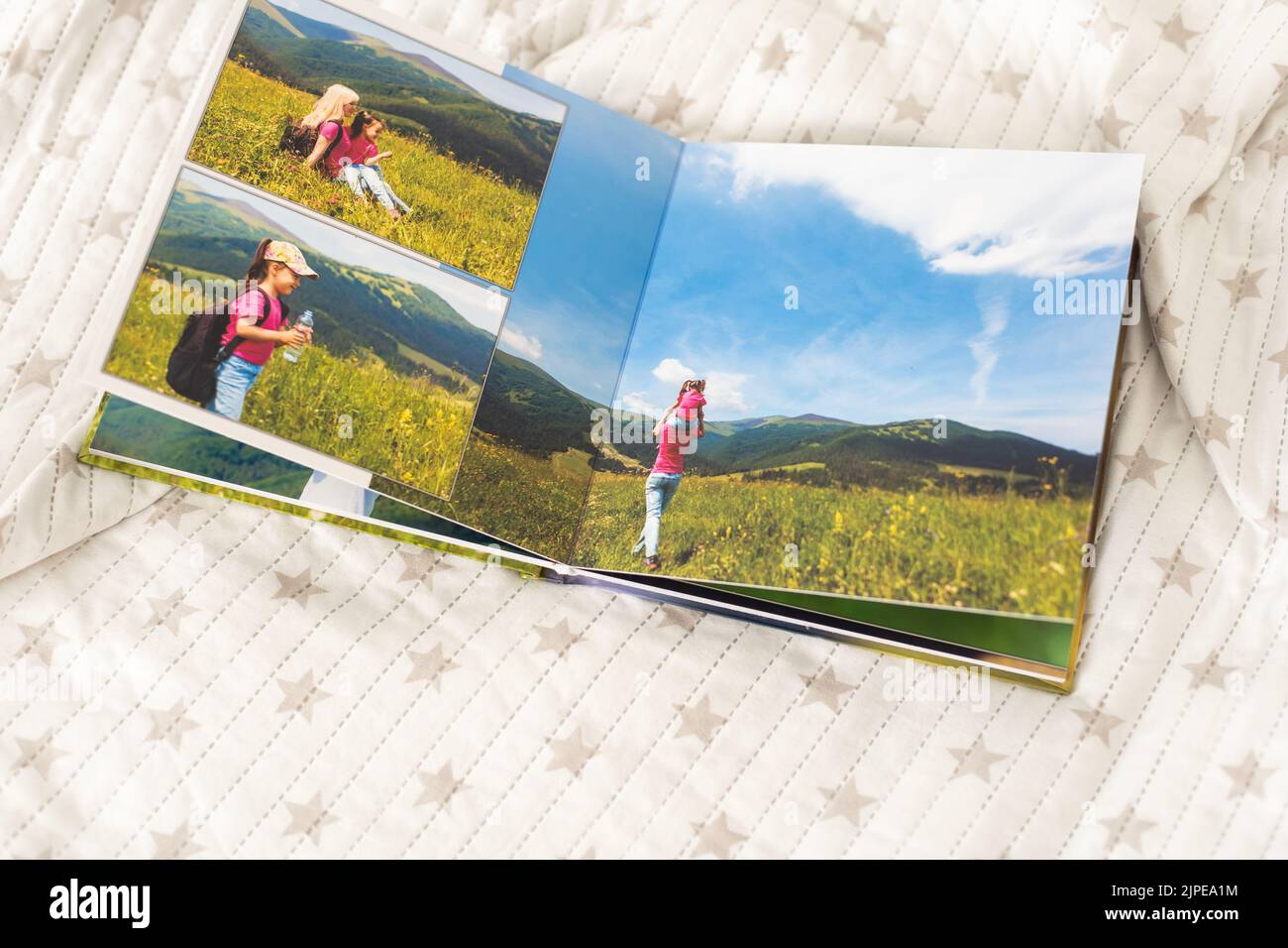 My Family Travel Photobooks, open photo book Stock Photo - Alamy