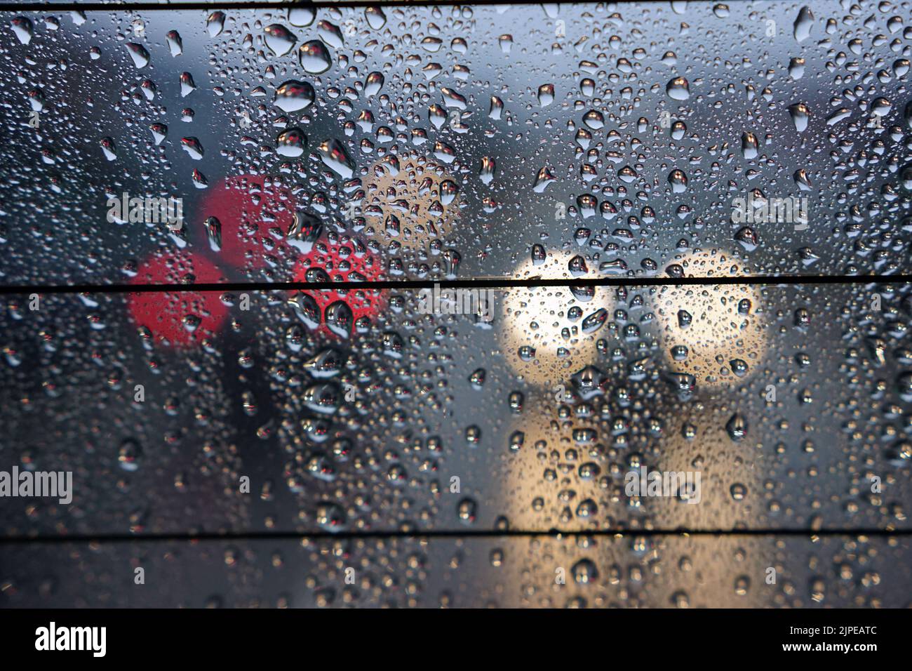 The raindrops on the windshield of the car Stock Photo - Alamy