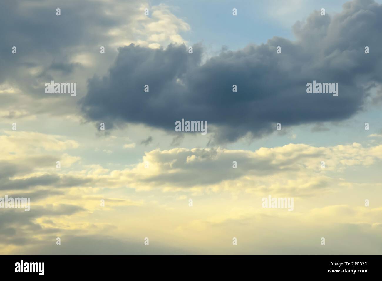 Beautiful sky with thunderstorms cumulus clouds at sunset. Blue sky ...