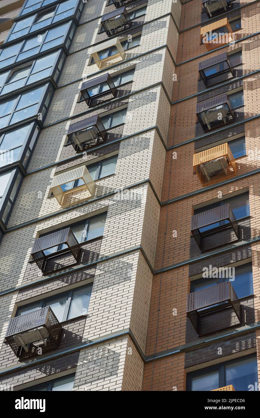 Building exterior with decorative air conditioner covers Stock Photo ...