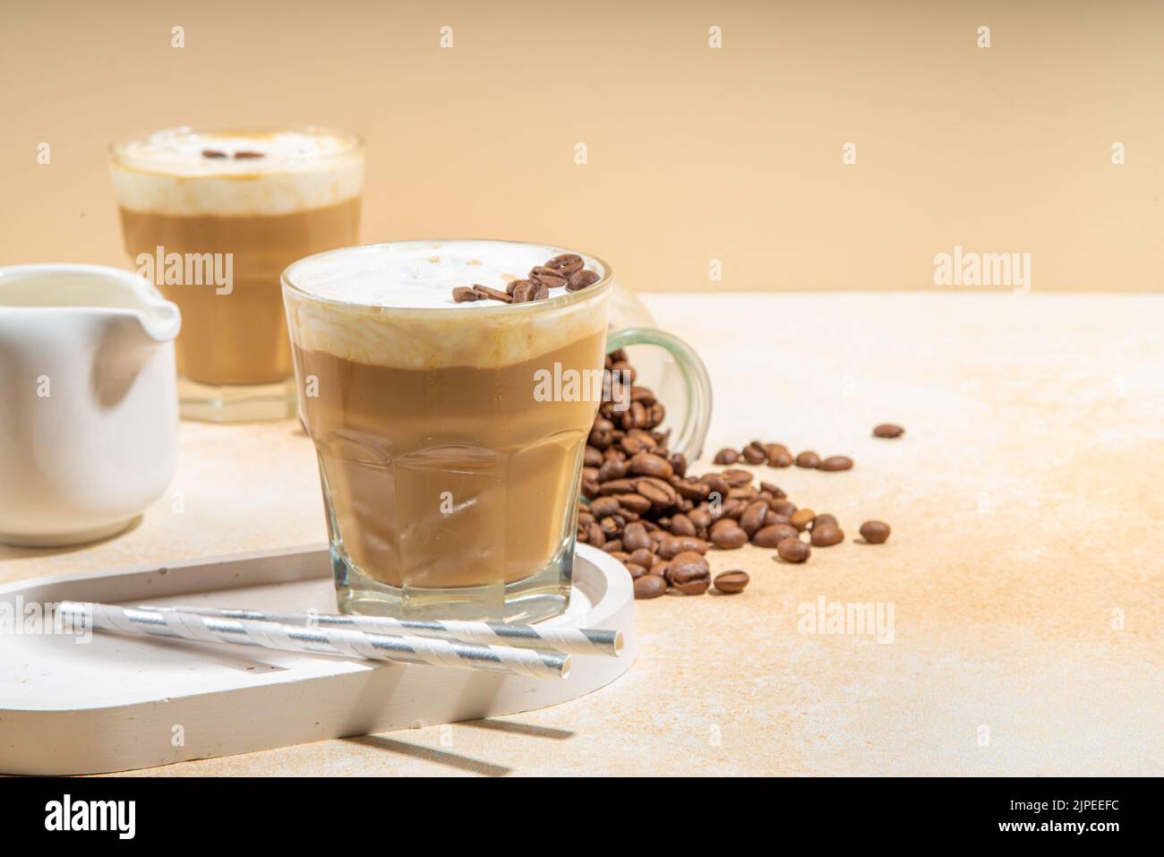 Cold dairy coffee drink with milk, whipped cream. Foamy frappe, latte ...