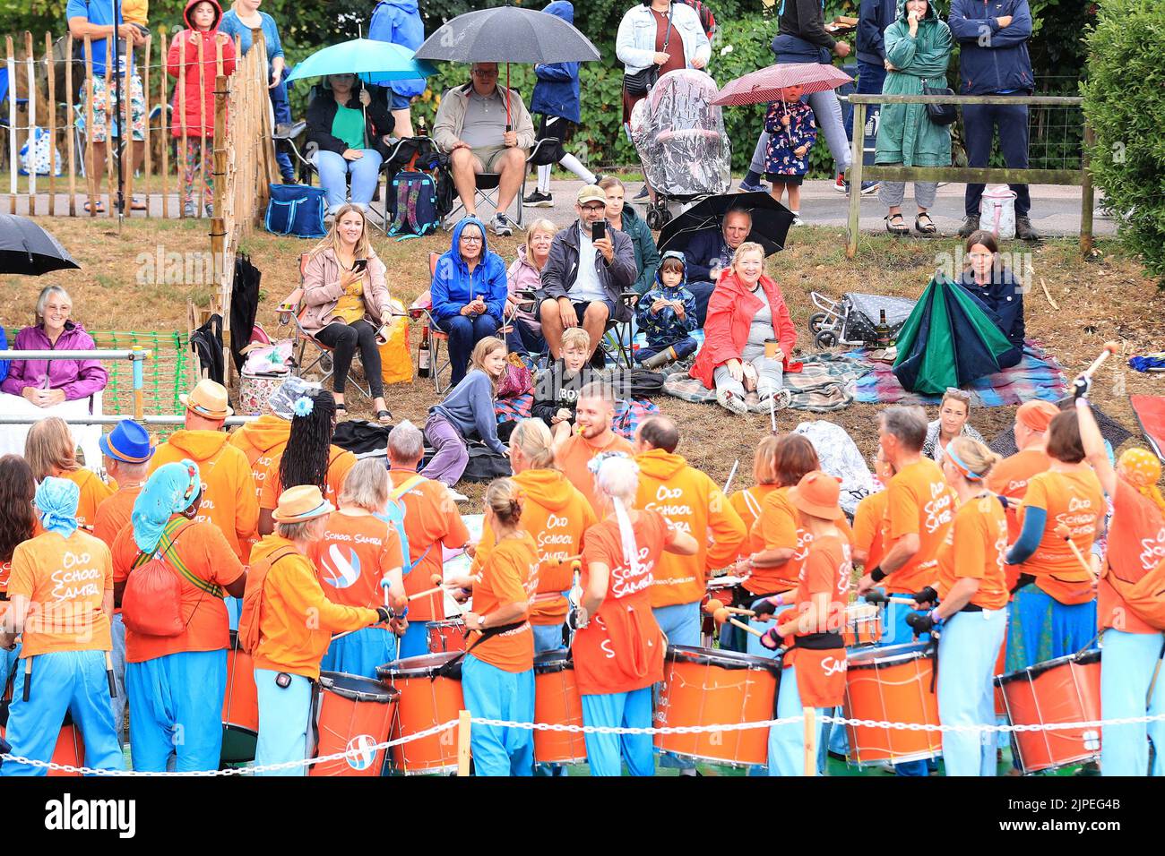 The crowd acknowledge the music from the Old School Samba float as it ...