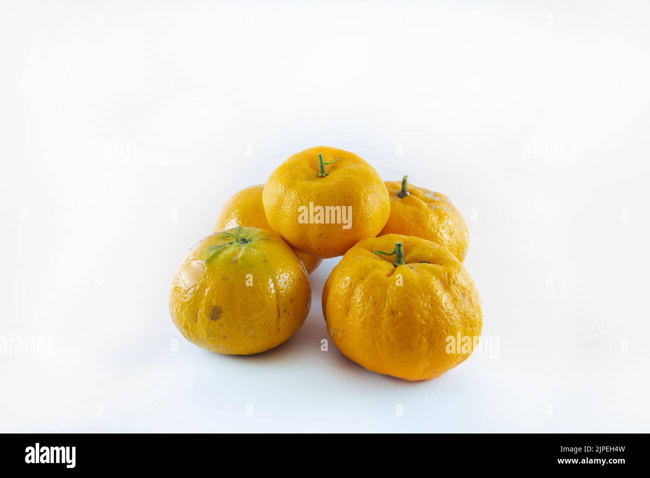 Surface covered with five ripe fresh juicy tangerines, composition ...