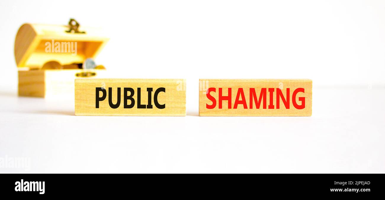 Public shaming symbol. Concept words Public shaming on wooden blocks on ...