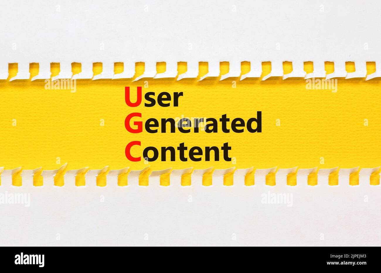 UGC user generated content symbol. Concept words UGC user generated content on yellow paper on a ...