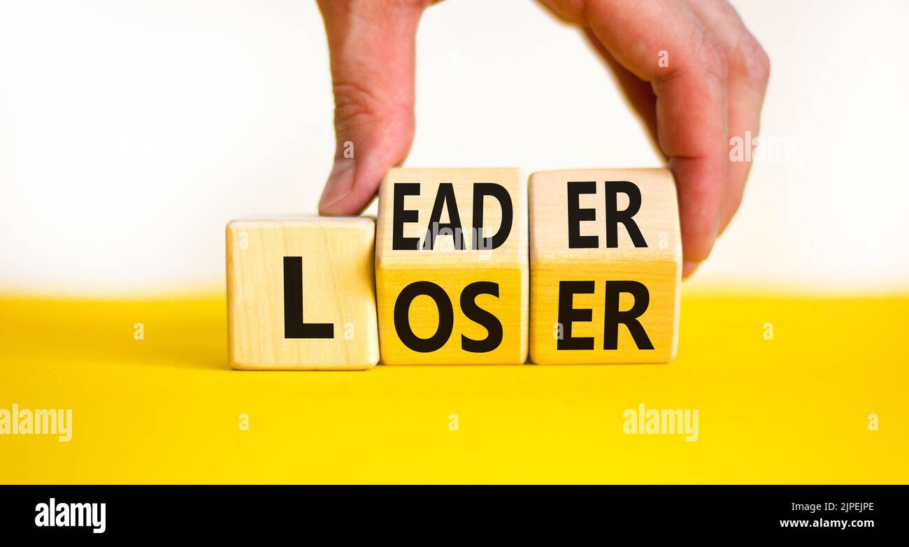 Loser or leader symbol. Concept words Loser or leader on wooden cubes ...