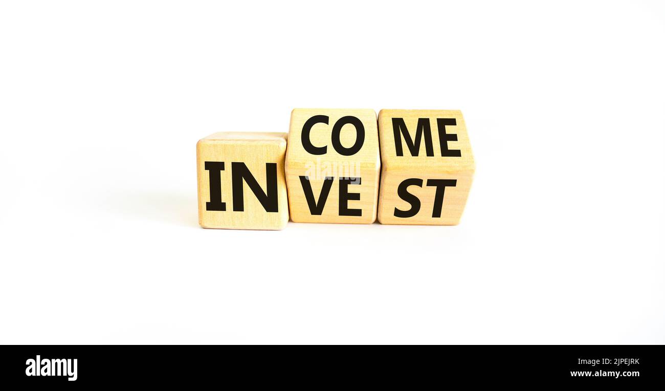 Invest or income symbol. Concept words Invest and Income on wooden ...