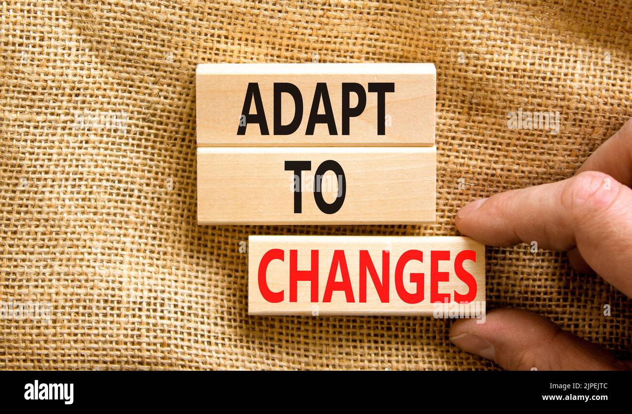 Adapt to changes symbol. Concept words Adapt to changes on wooden ...