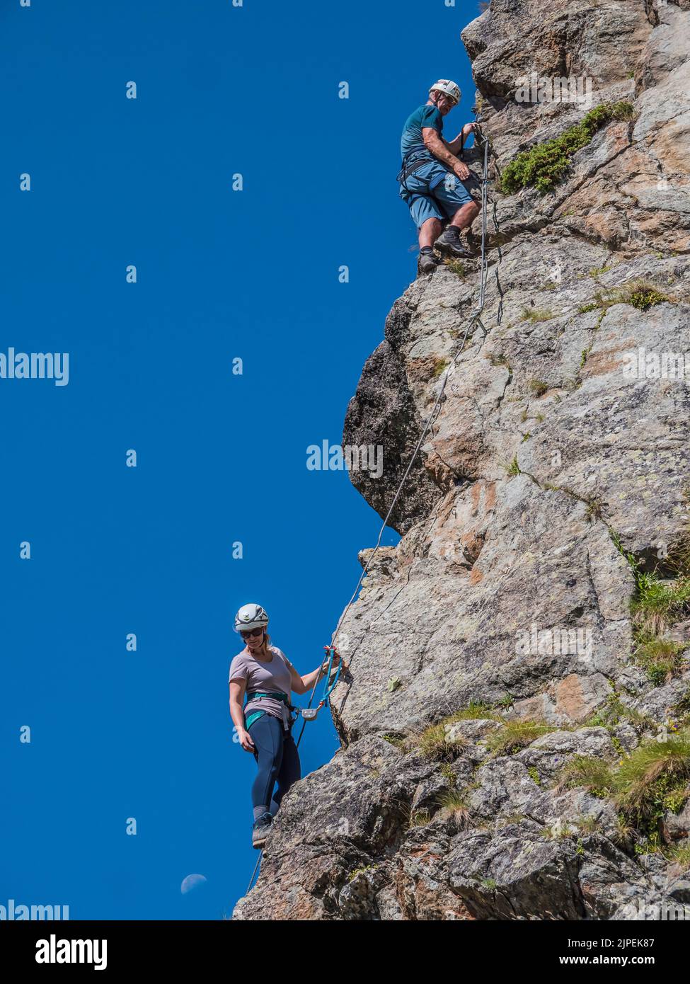 The image is of people on the Klettersteig climb near the Franz Senn ...