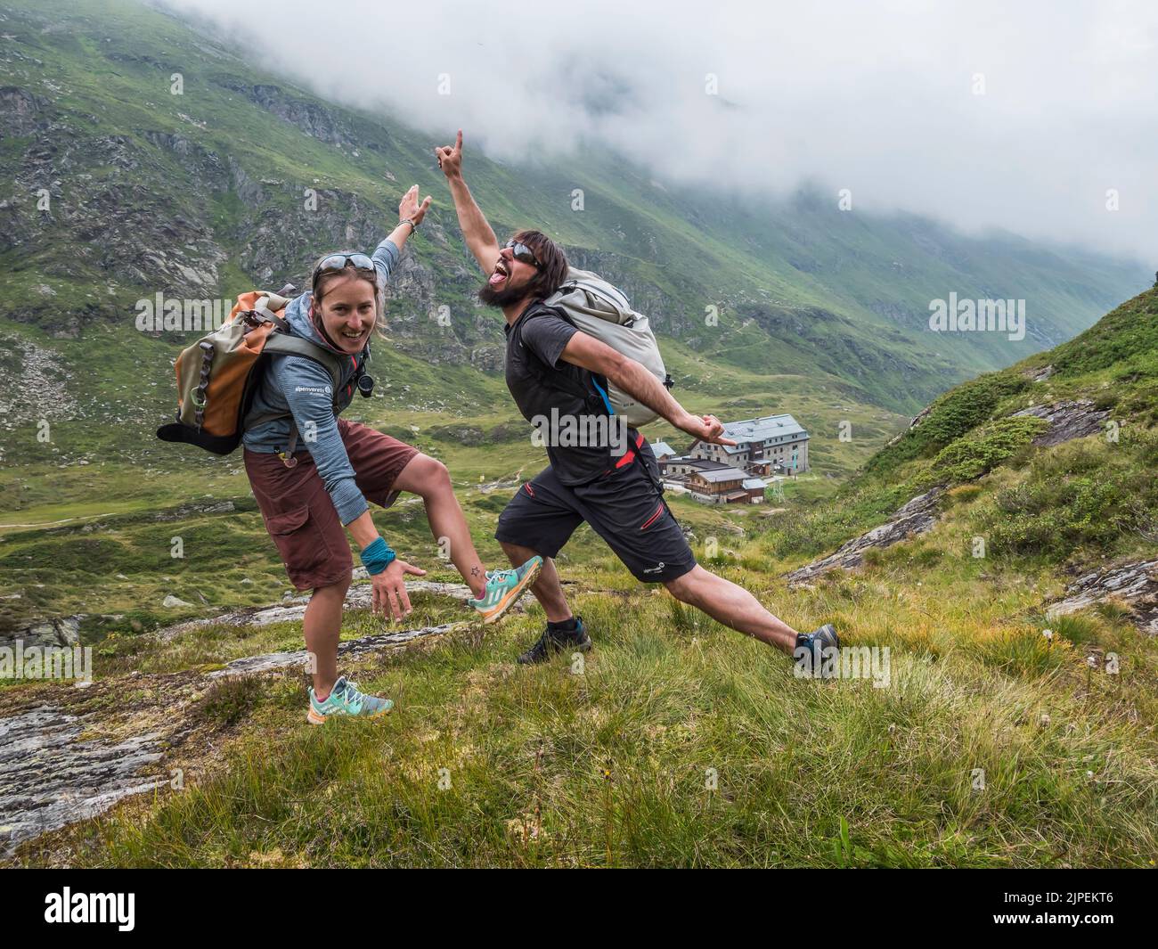 The image is of mountain guides Eva Schider and Felix Autor working near the Franz Senn Hut in ...