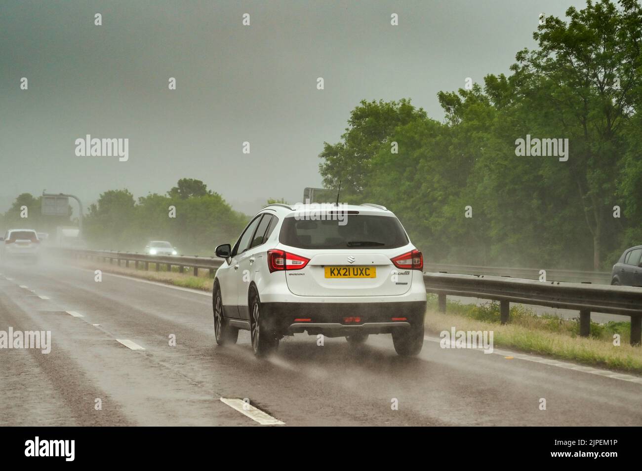 Swindon, England - May 2022: Traffic on the M4 motorway in bad weather ...