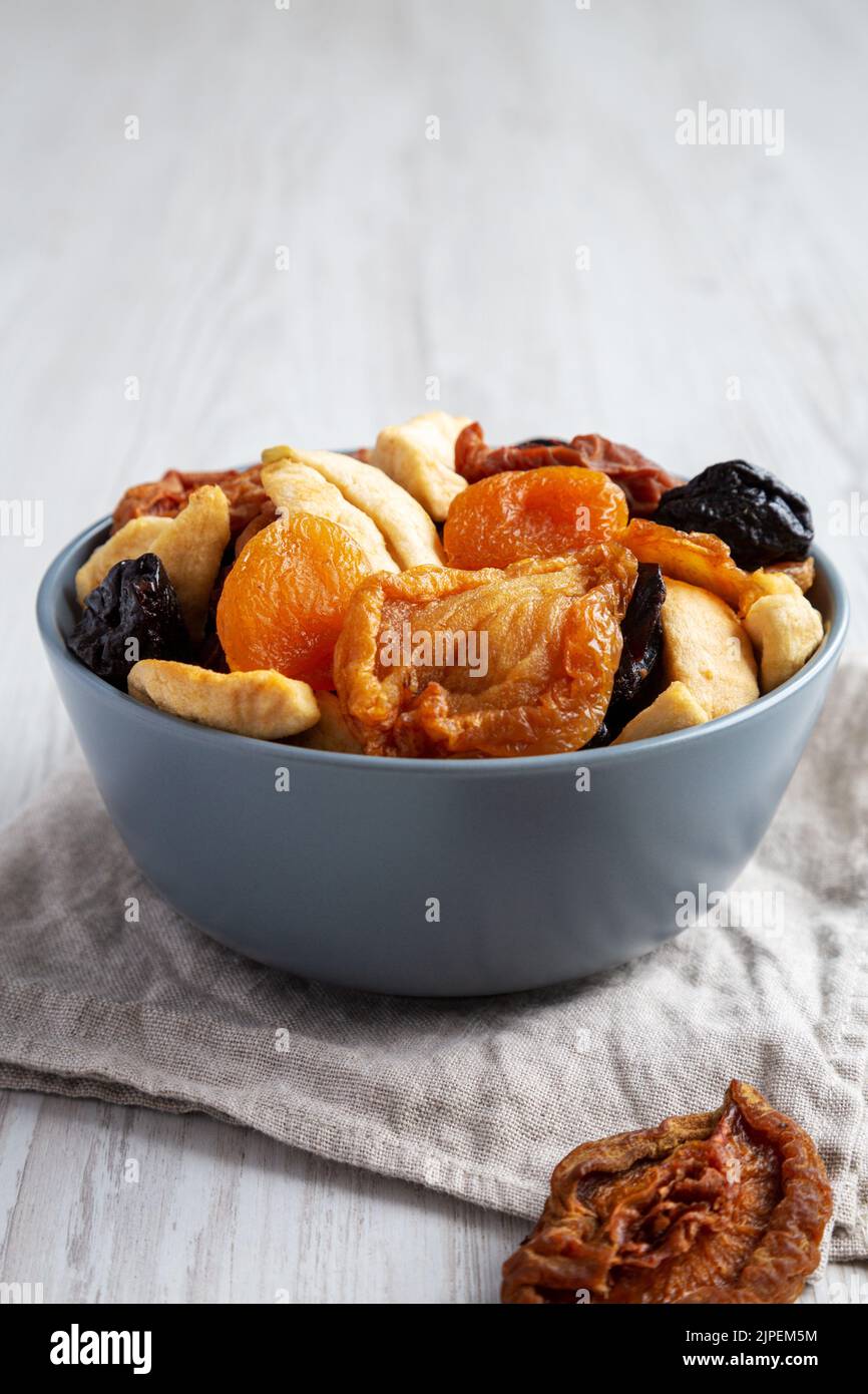 Organic healthy fruit mix in a bowl, low angle view. Close-up Stock ...