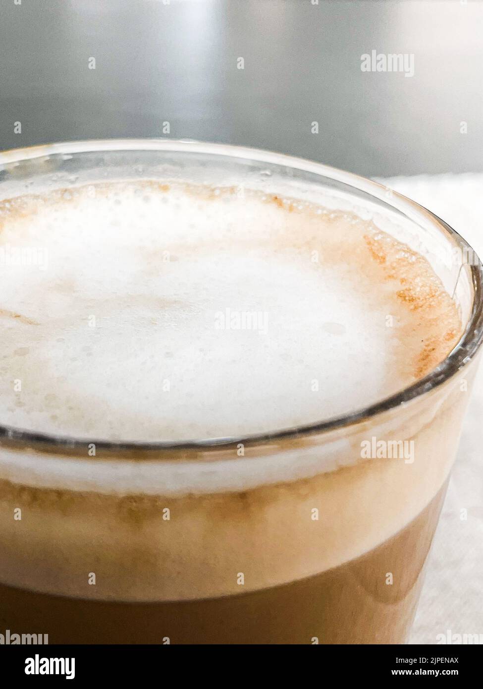 A vertical shot of foam on top of coffee Stock Photo - Alamy