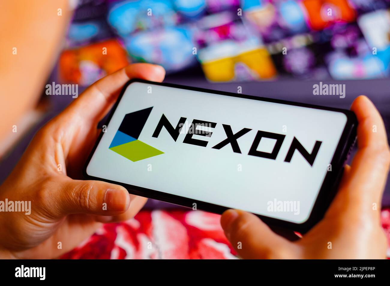 In this photo illustration, the Nexon logo is displayed on a smartphone ...