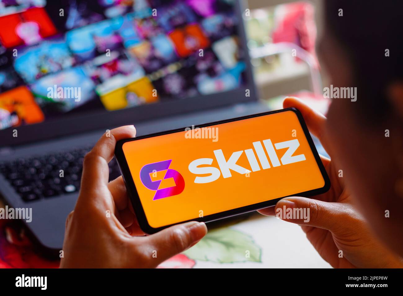 In this photo illustration, the Skillz logo is displayed on a ...