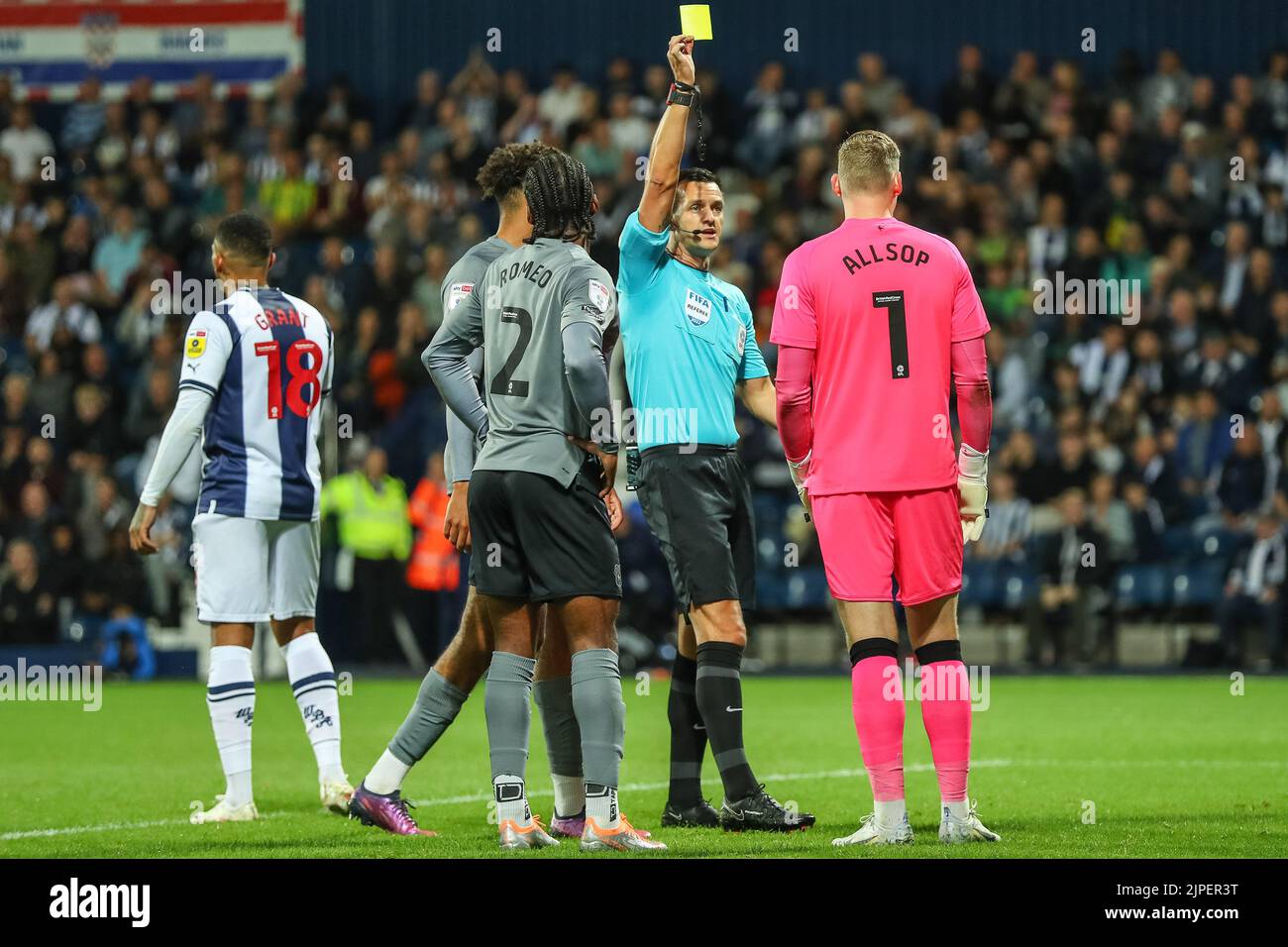 Ryan Allsop #1 of Cardiff City receives a yellow card from referee Andy ...