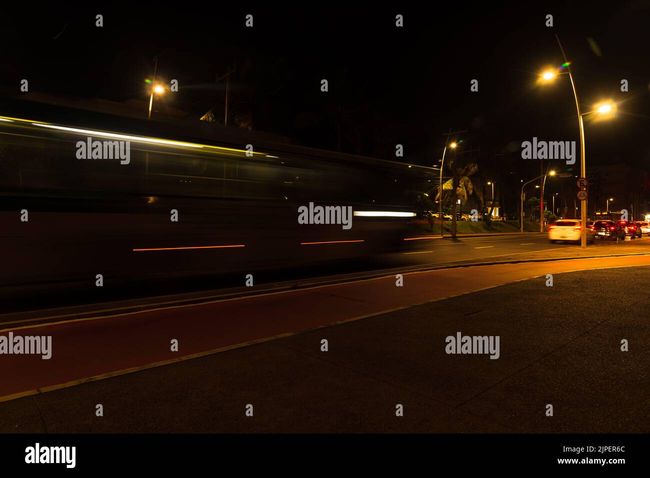 Colorful light trails with motion blur effect of a bus, long time ...