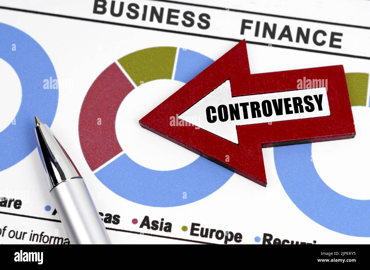 Business concept. Against the background of the diagrams, an arrow with ...