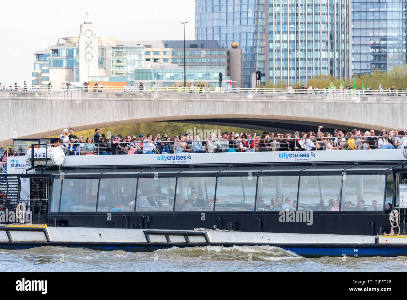 CityCruises, by Hornblower, sightseeing vessel passing under Waterloo ...
