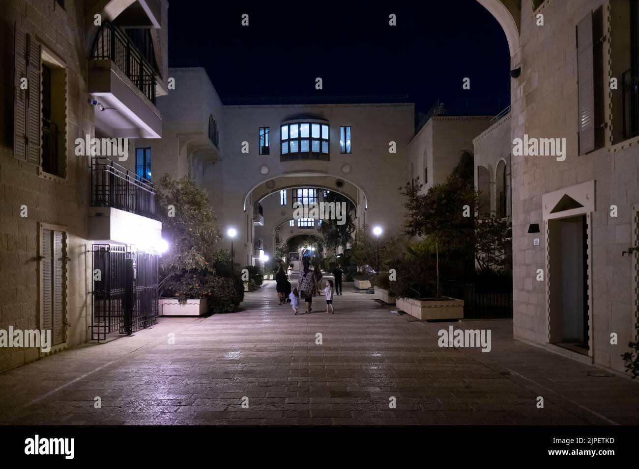 People walk through the luxury residential project named David's ...