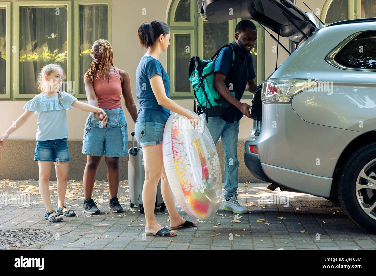 Loading luggage small car hi-res stock photography and images - Alamy