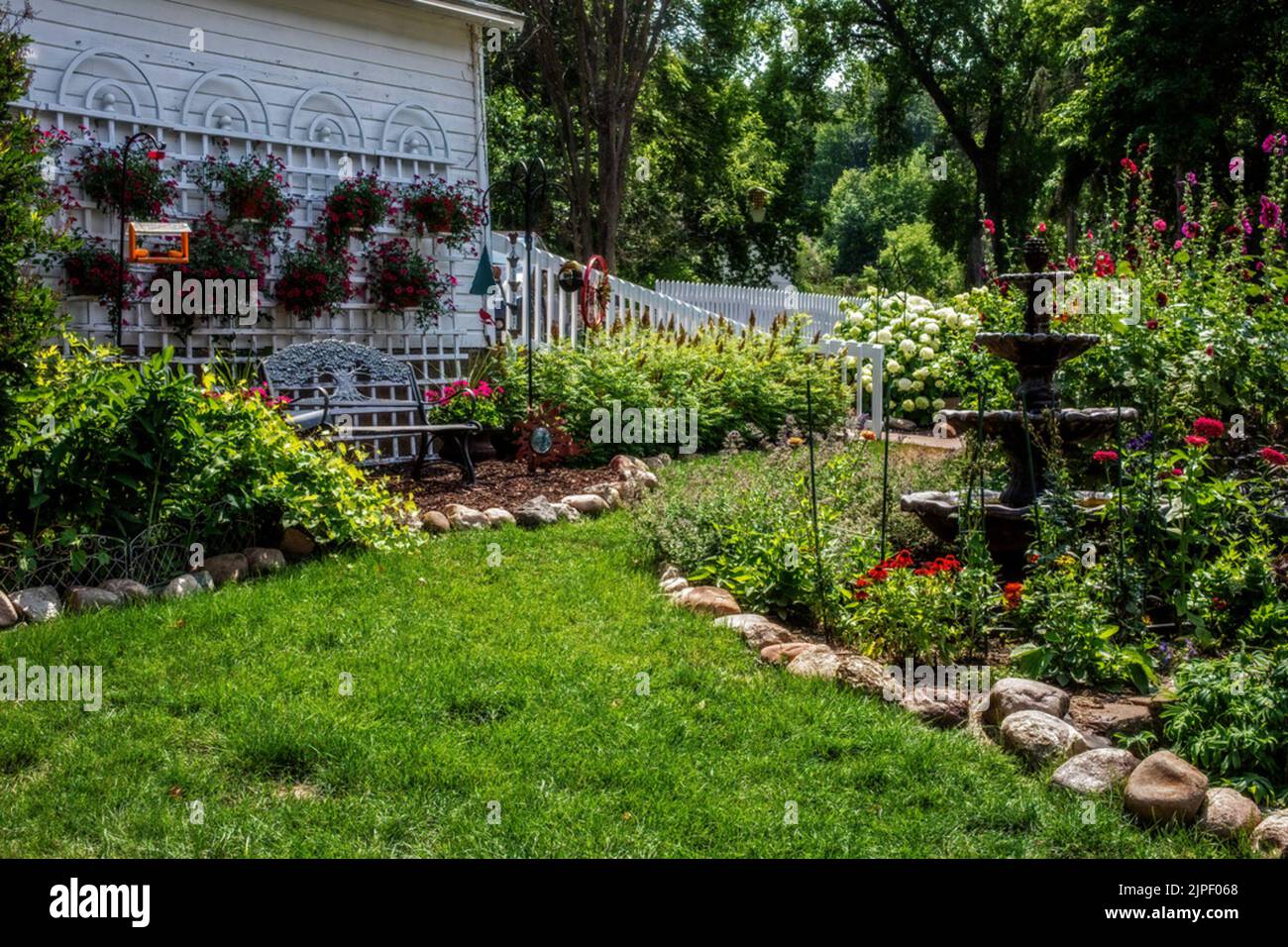 Beautiful summer garden with a fountain called The Serenity Fountain ...