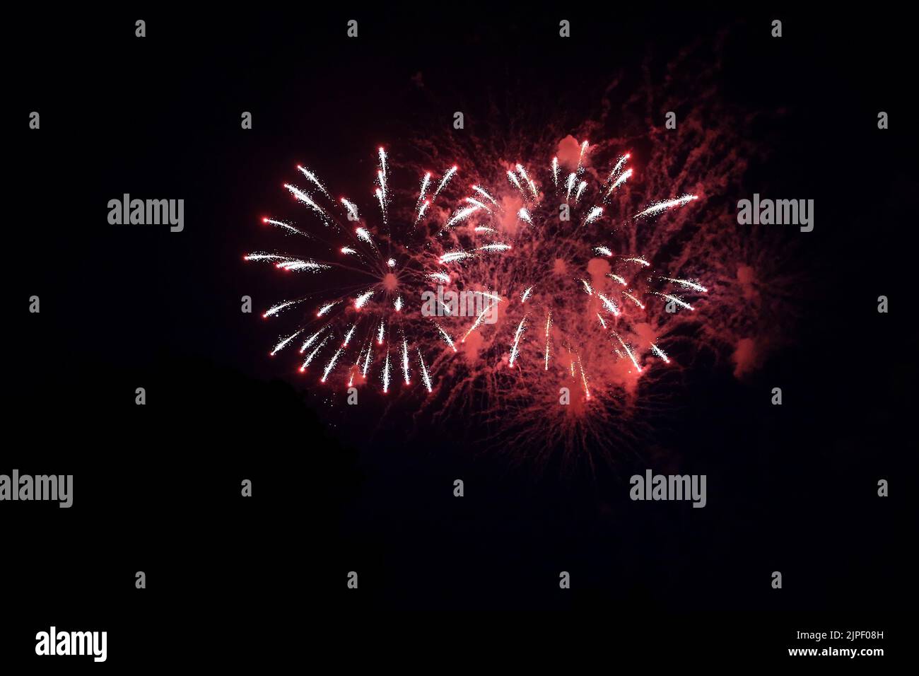 A firework display signifies the start of the Illuminated Parade part ...