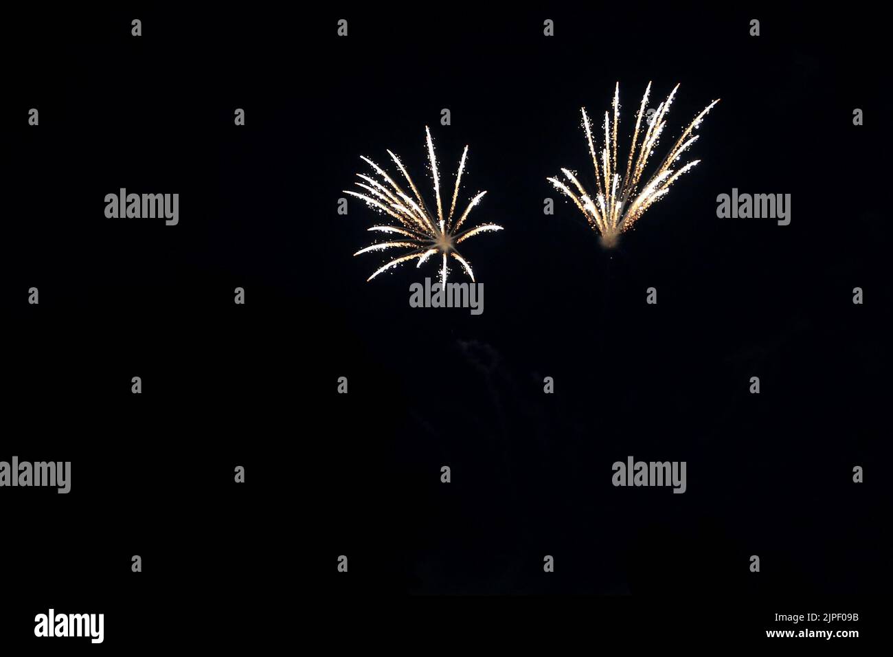 A firework display signifies the start of the Illuminated Parade part ...