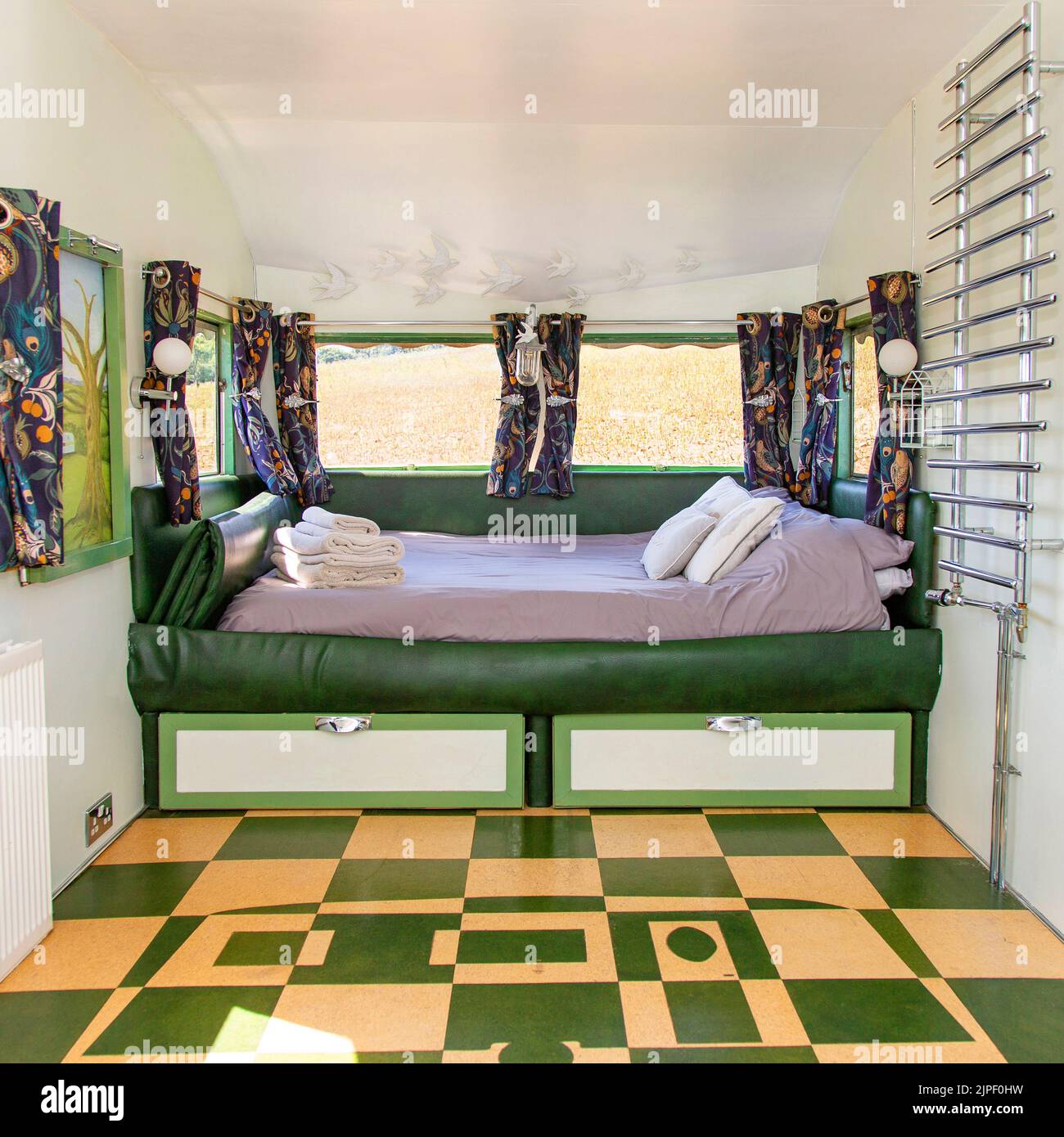 Interior bedroom at the Bluebird Penthouse caravan, High Bickington ...