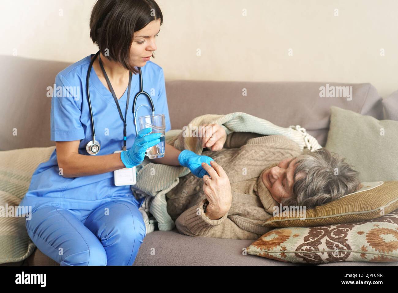 Happy retired woman and trust between doctor and patient Stock Photo ...