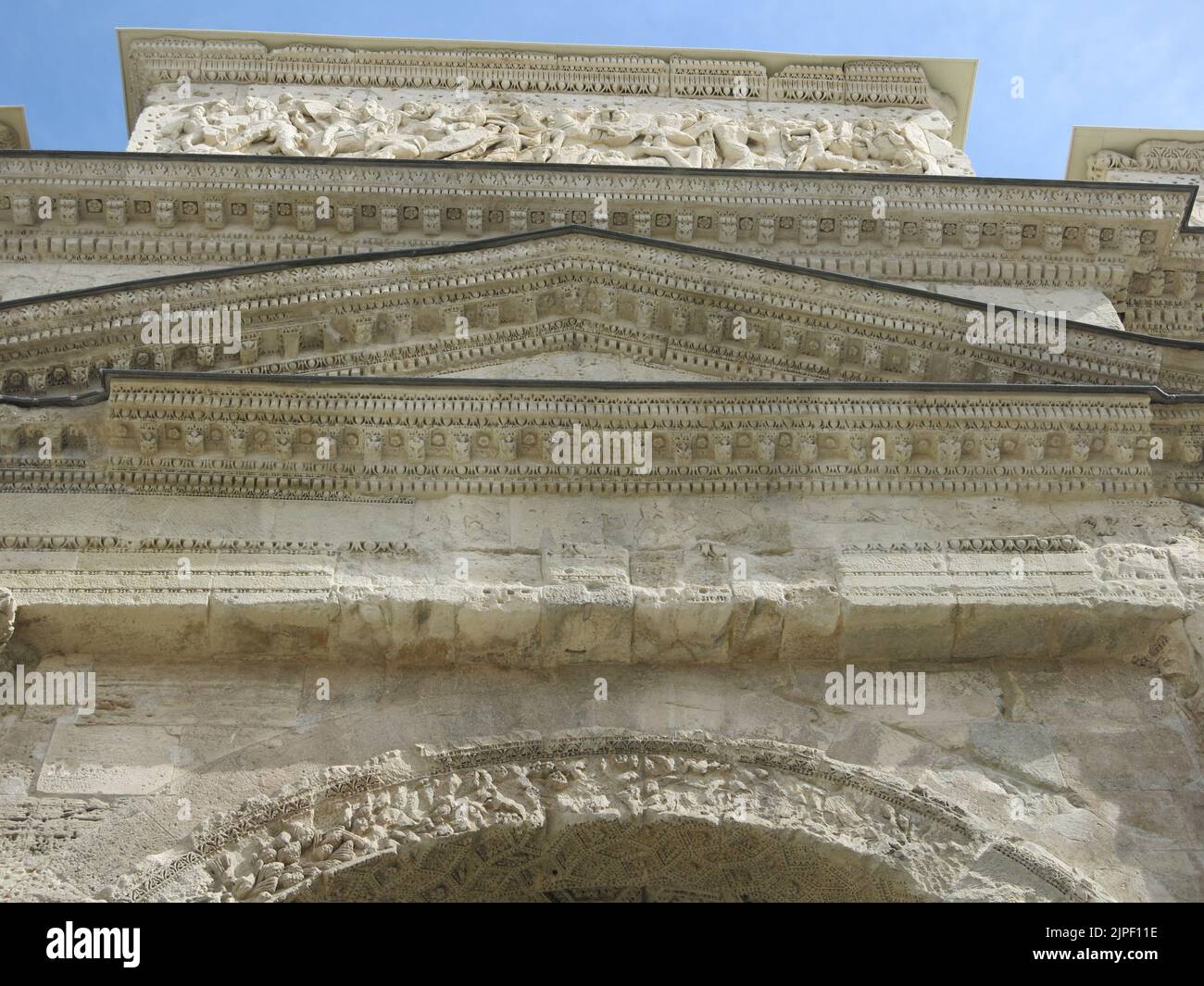 The ornate carving at the top of the Roman Triumphal Arch in the town ...